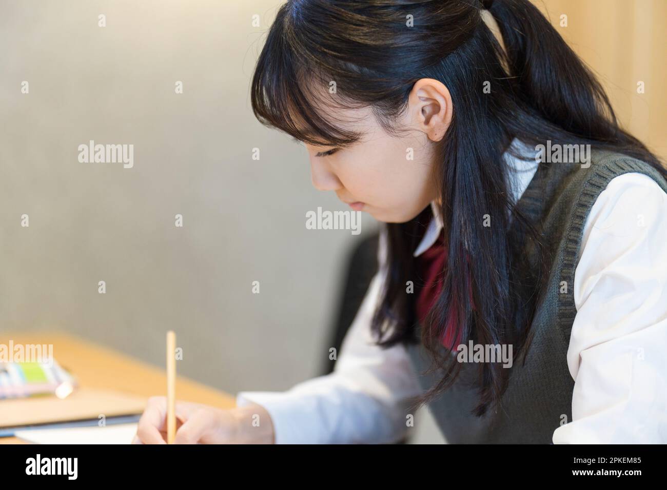 High school girl studying at home Stock Photo - Alamy