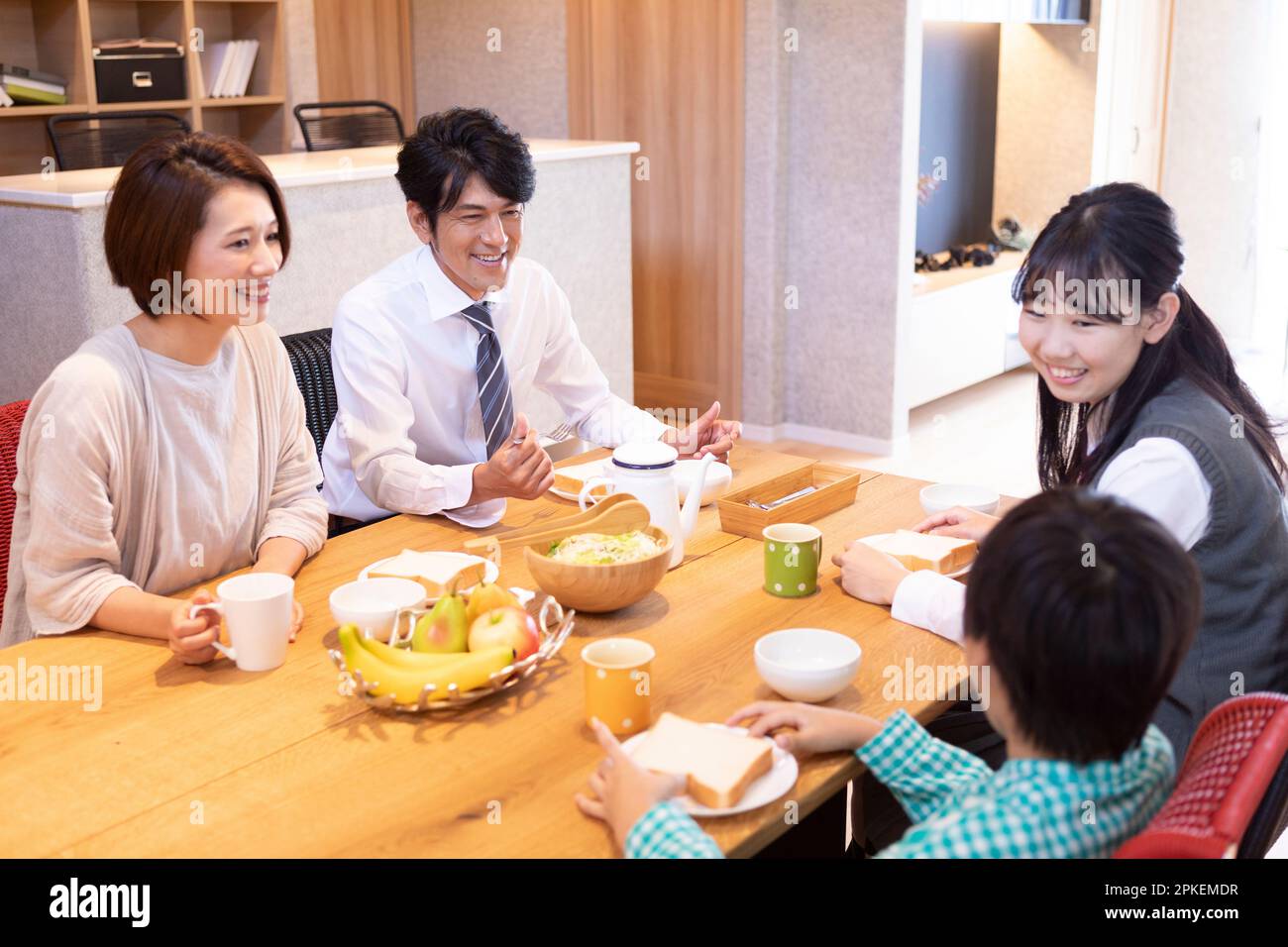 Family eating breakfast Stock Photo - Alamy