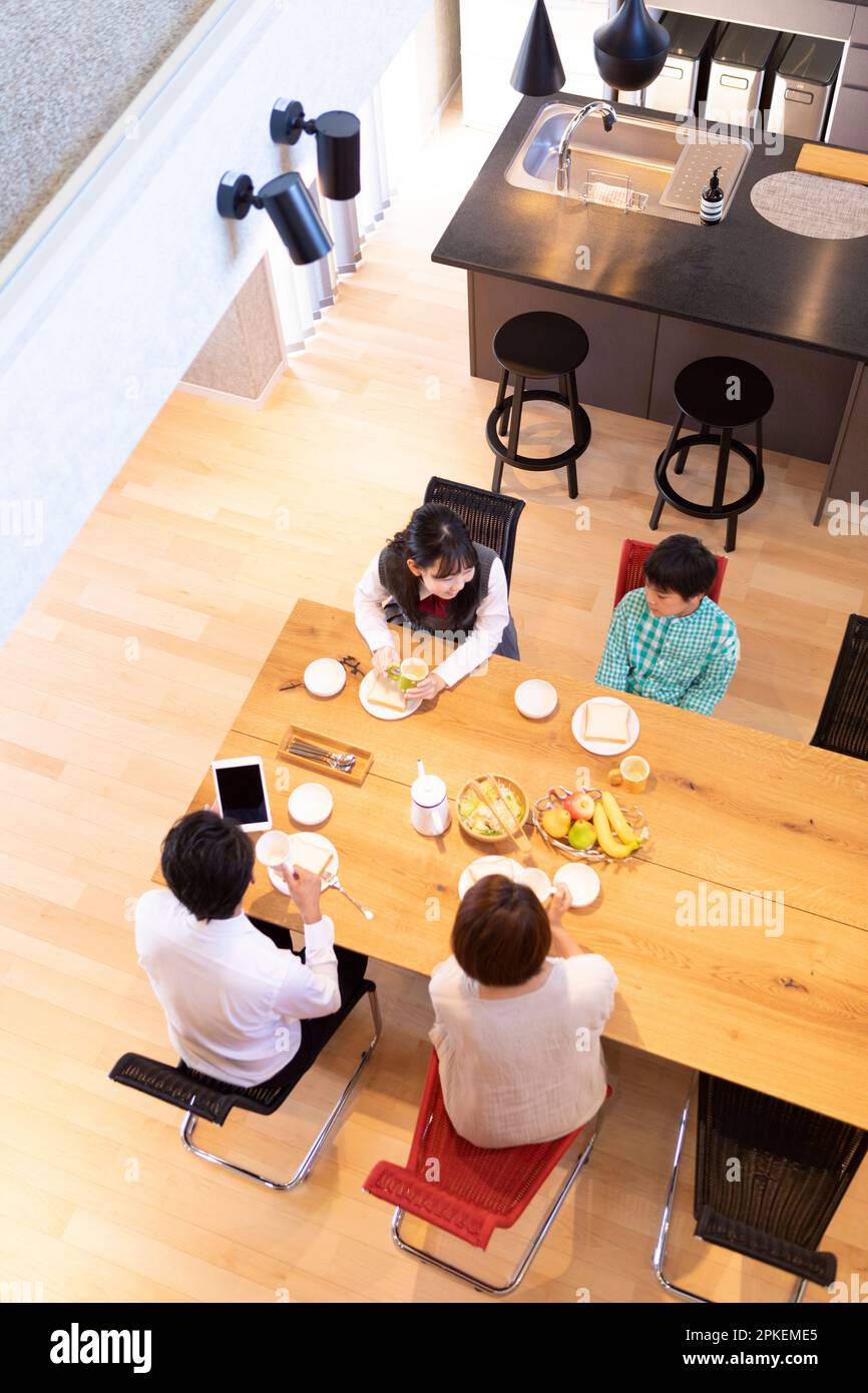 Family eating breakfast Stock Photo - Alamy