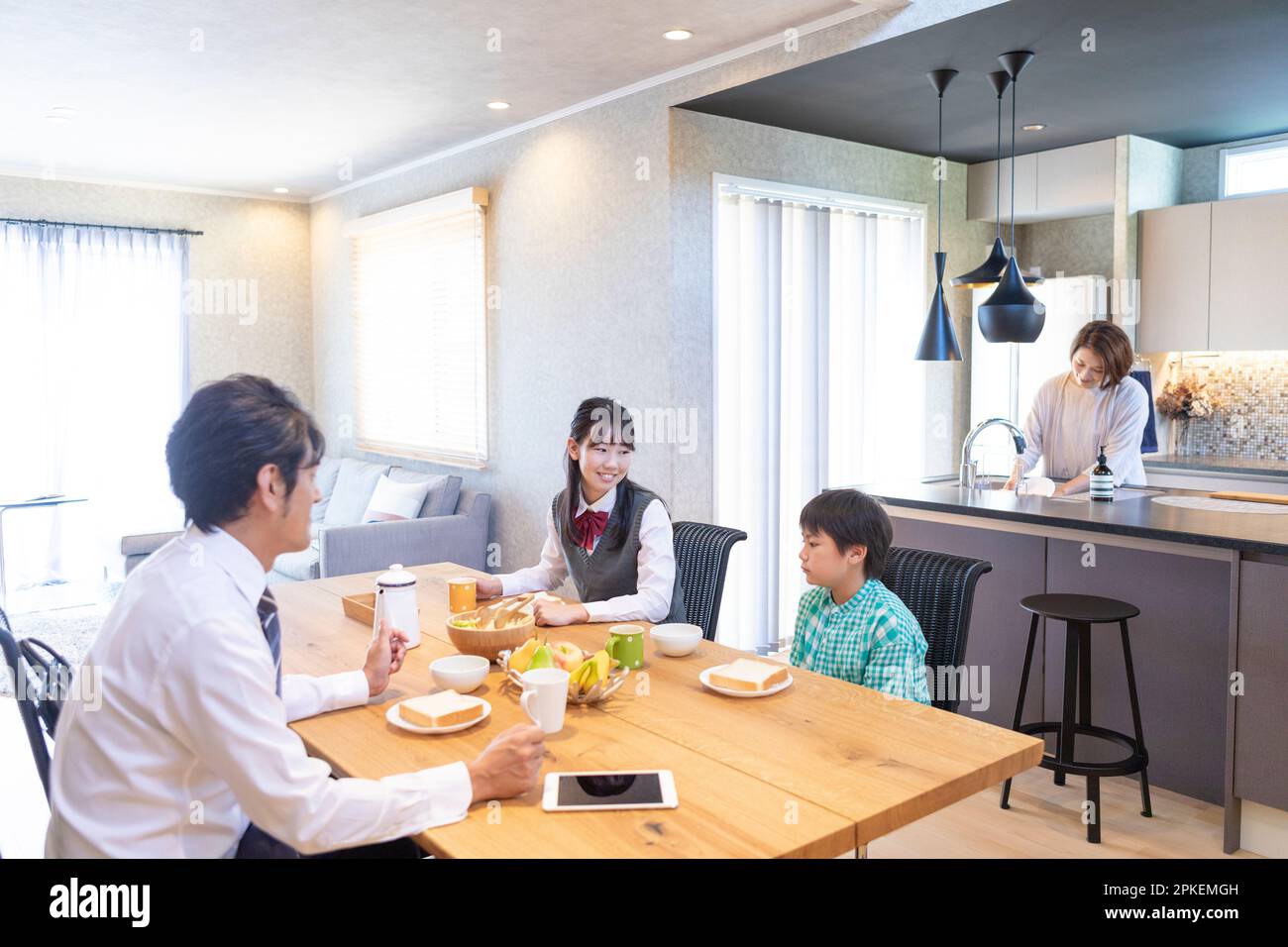 Family Eating Breakfast Stock Photo - Alamy