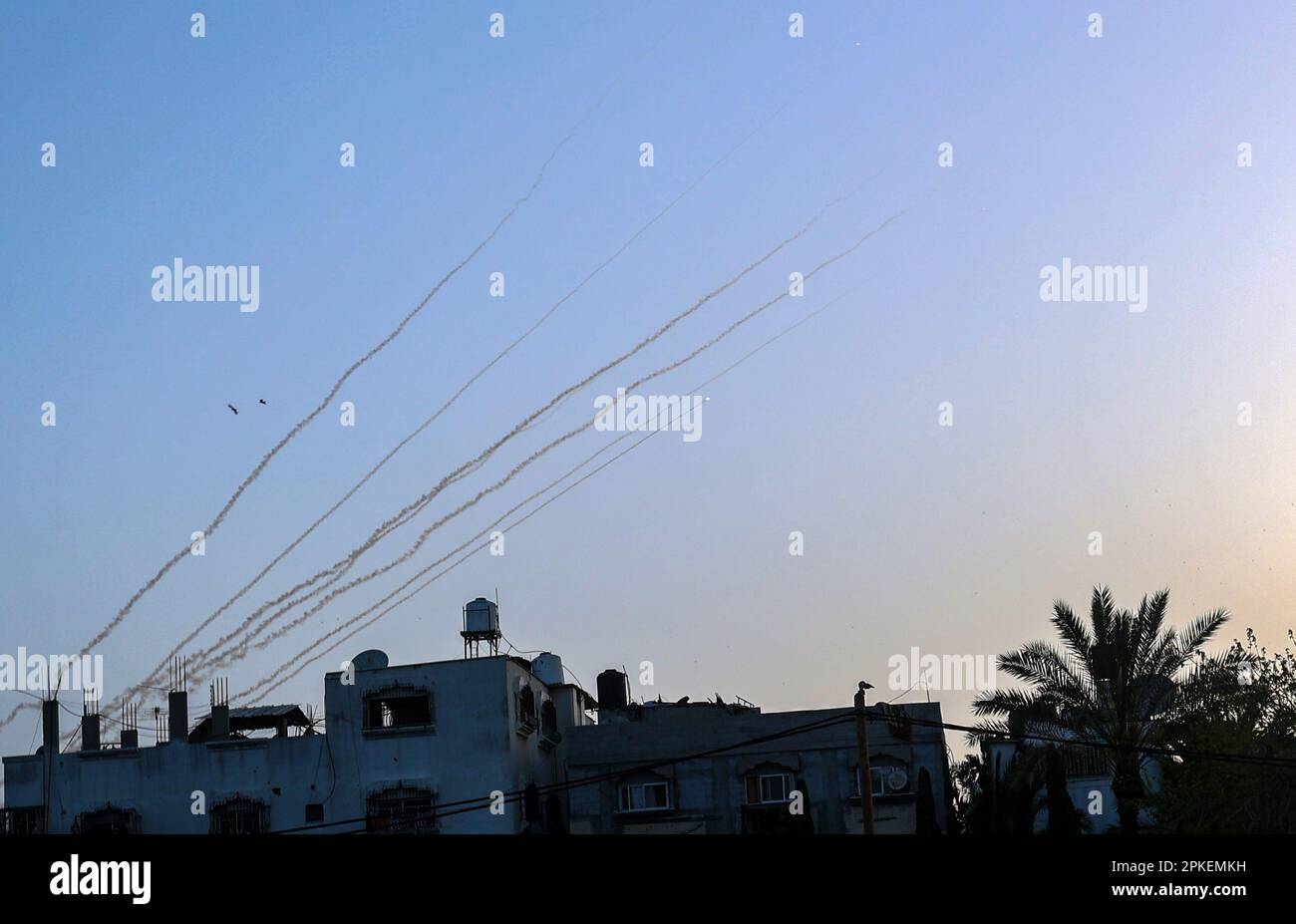 Palestinian rockets are seen in the sky are launched from Gaza toward ...