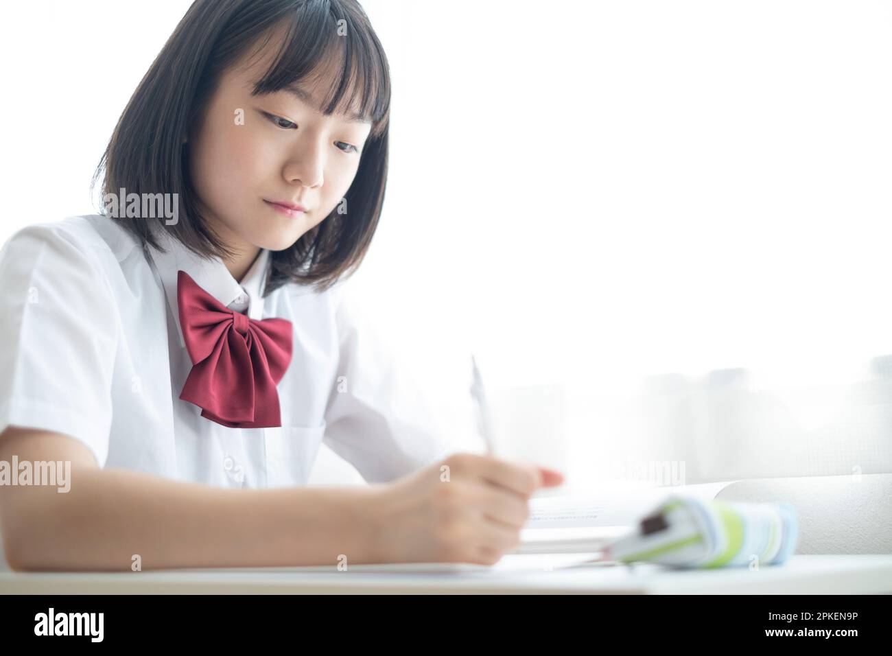 High school girls taking a class Stock Photo - Alamy