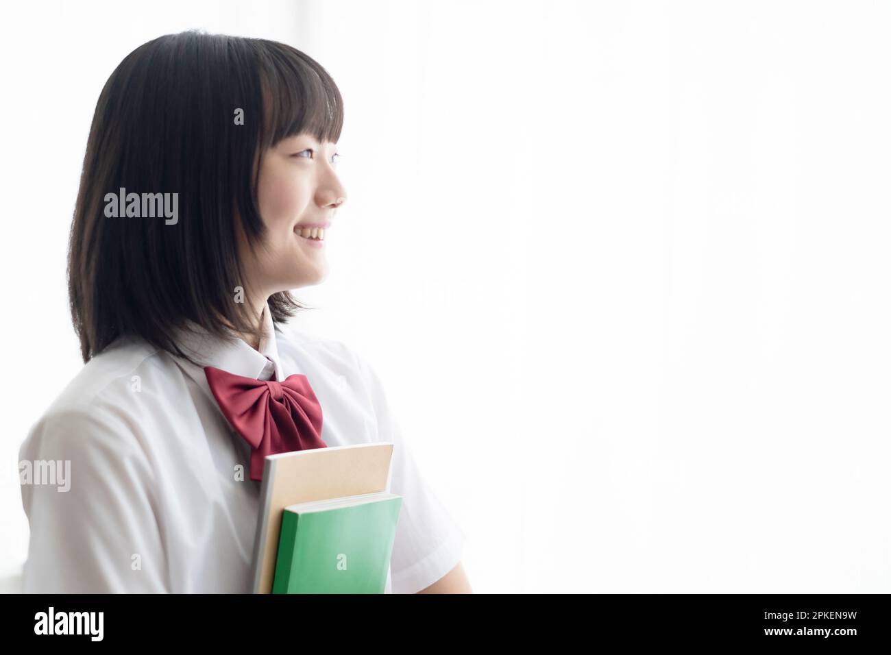 Portrait of a High School Girl Standing in a Classroom Stock Photo - Alamy