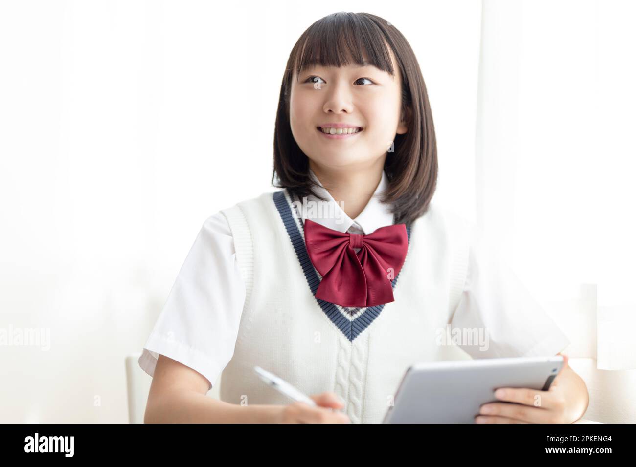 High school girls taking a class Stock Photo - Alamy