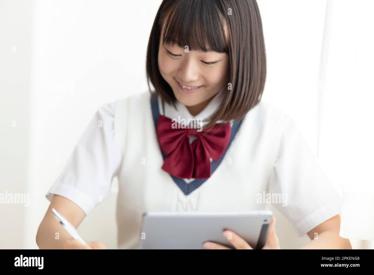 High school girls taking a class Stock Photo - Alamy