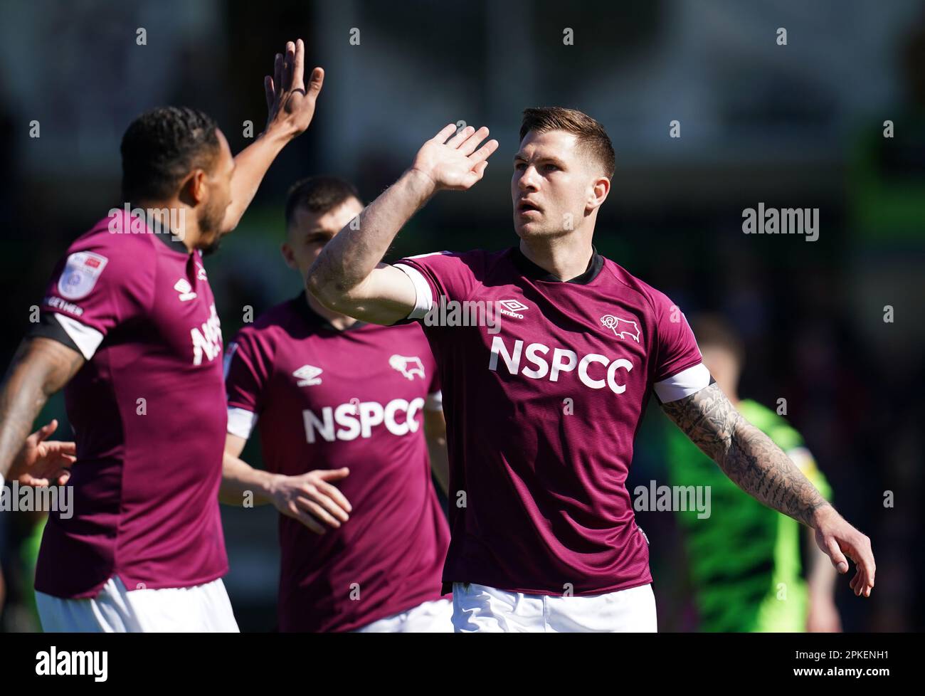 Derby County's James Collins celebrates scoring their side's first goal ...