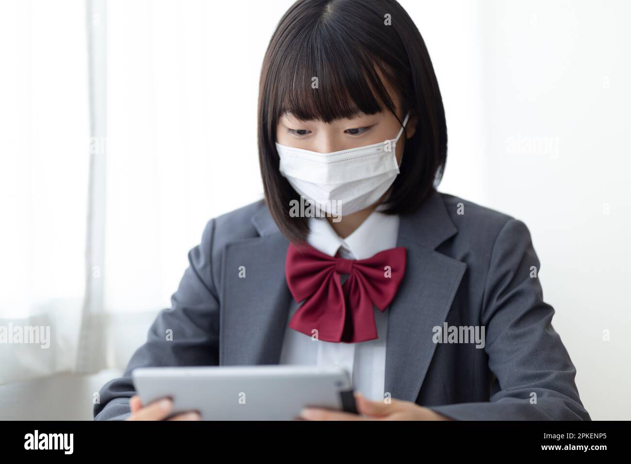 High school girls wearing masks in class Stock Photo - Alamy