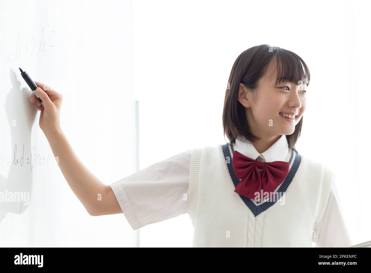 High school girls solving a problem Stock Photo - Alamy