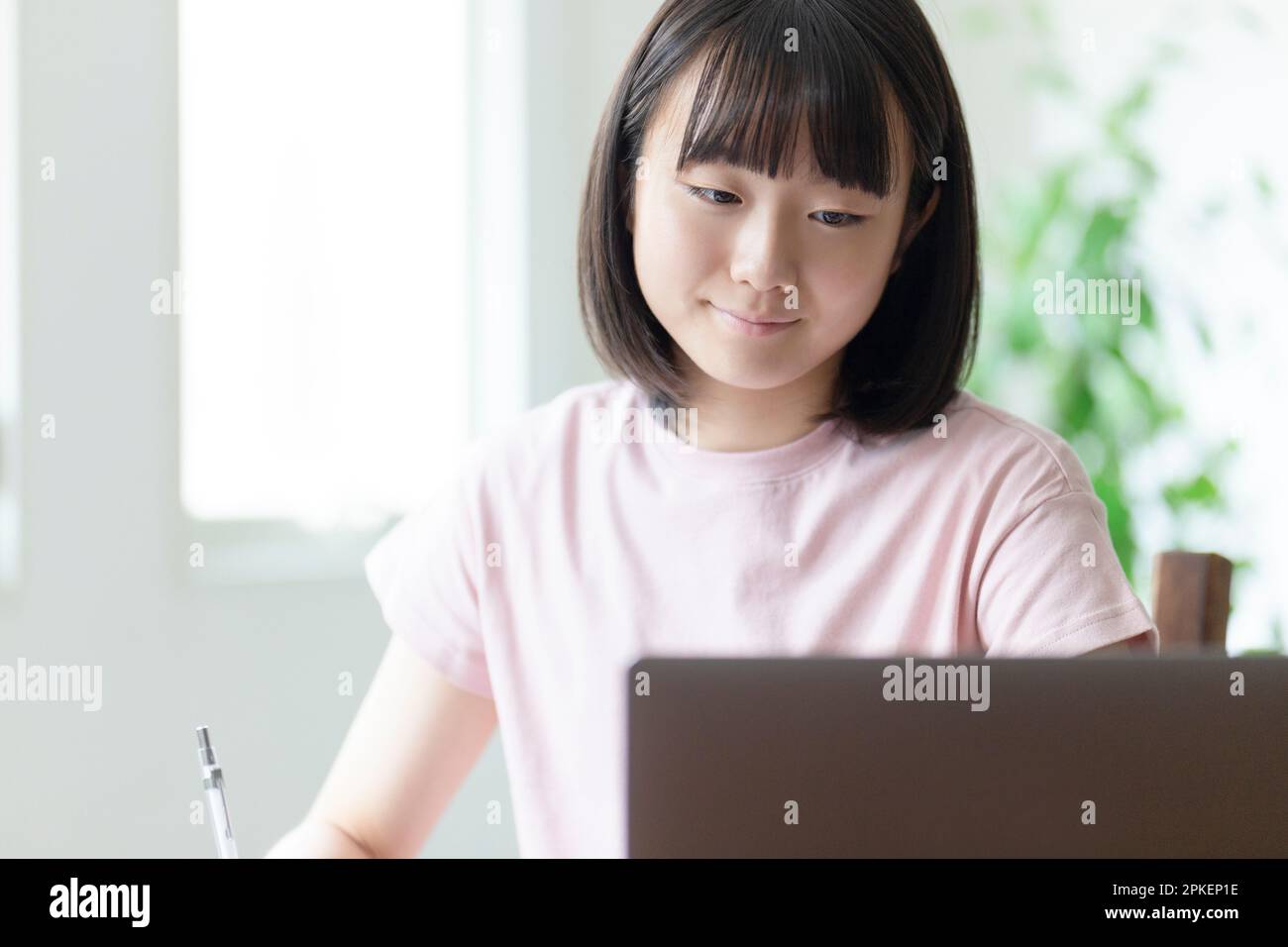Girl touching computer Stock Photo - Alamy