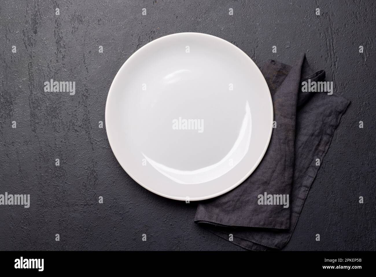 Top-down view of an empty plate and silverware mockup, perfect for ...