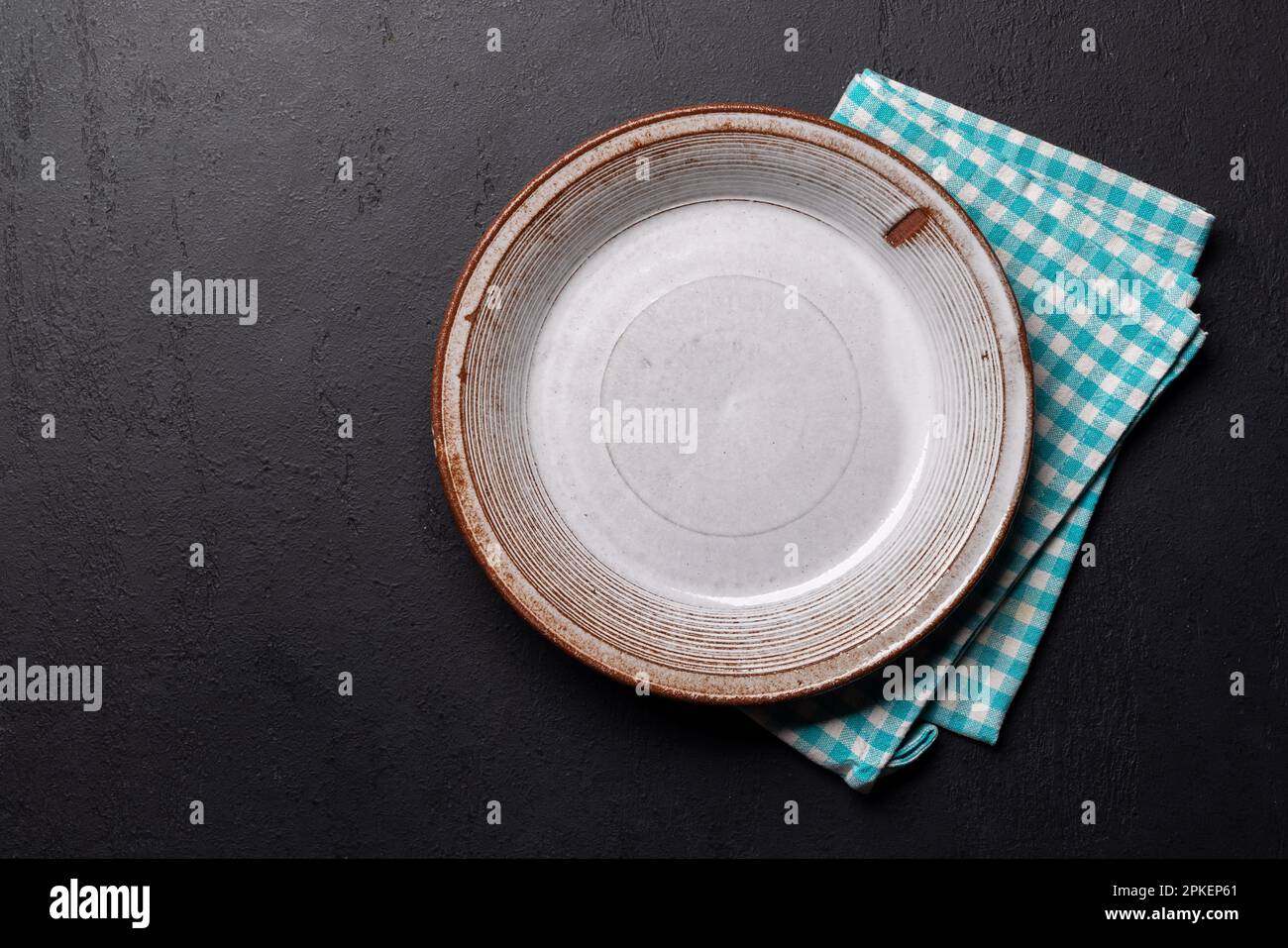 Top-down view of an empty plate and silverware mockup, perfect for ...