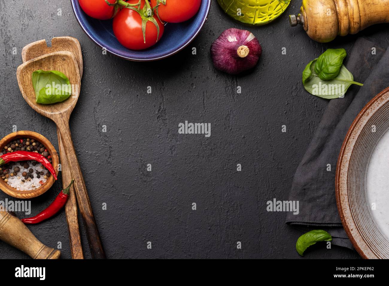 Top-down view of a kitchen table with ingredients, utensils, and copy ...