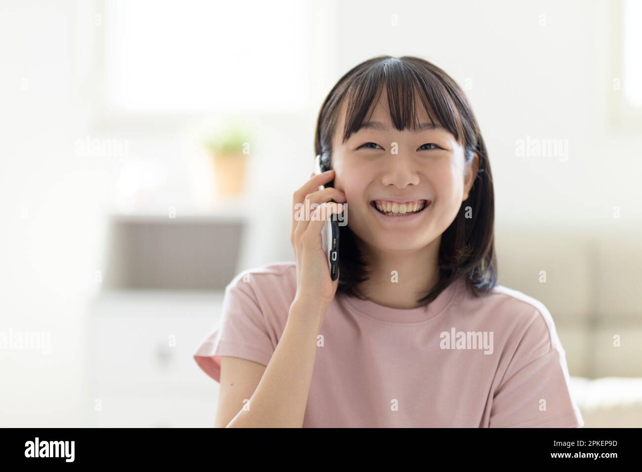 Girl making a phone call Stock Photo - Alamy