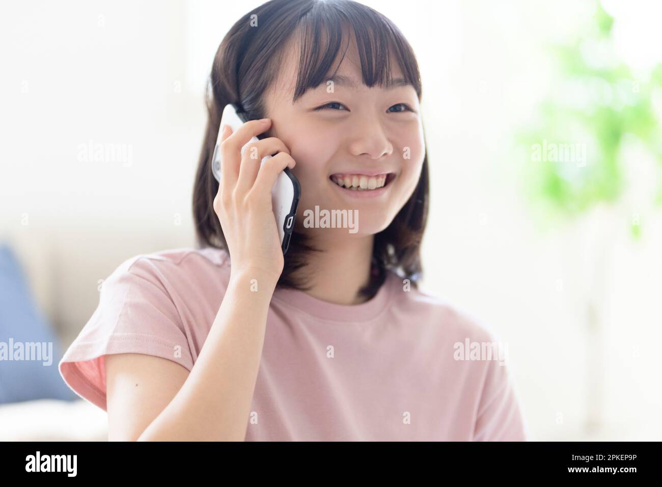 Girl making a phone call Stock Photo - Alamy