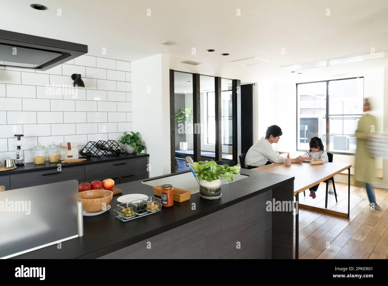 Parents and children doing housework and painting Stock Photo - Alamy