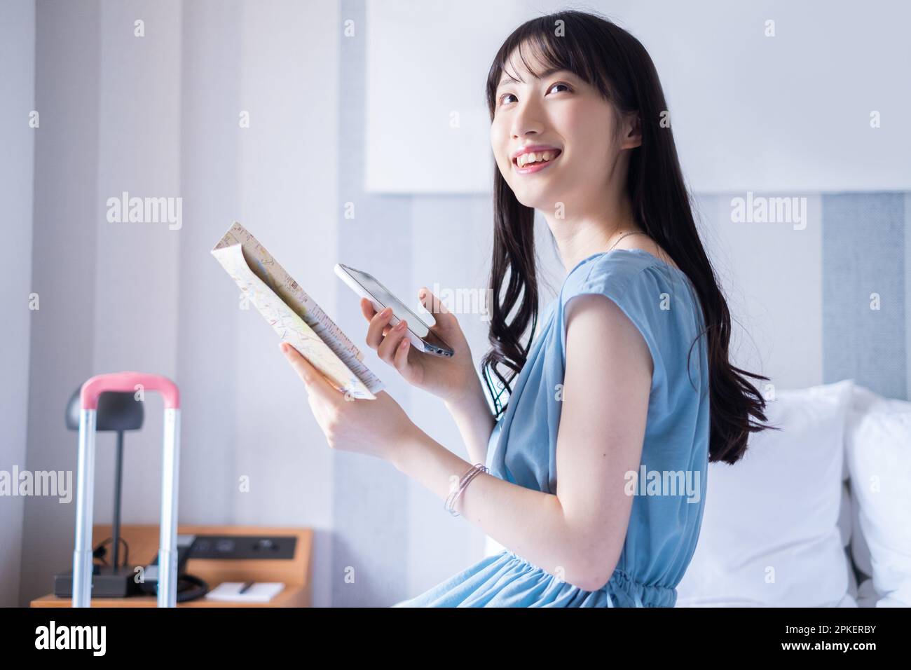 Woman relaxing on hotel hi-res stock photography and images - Alamy