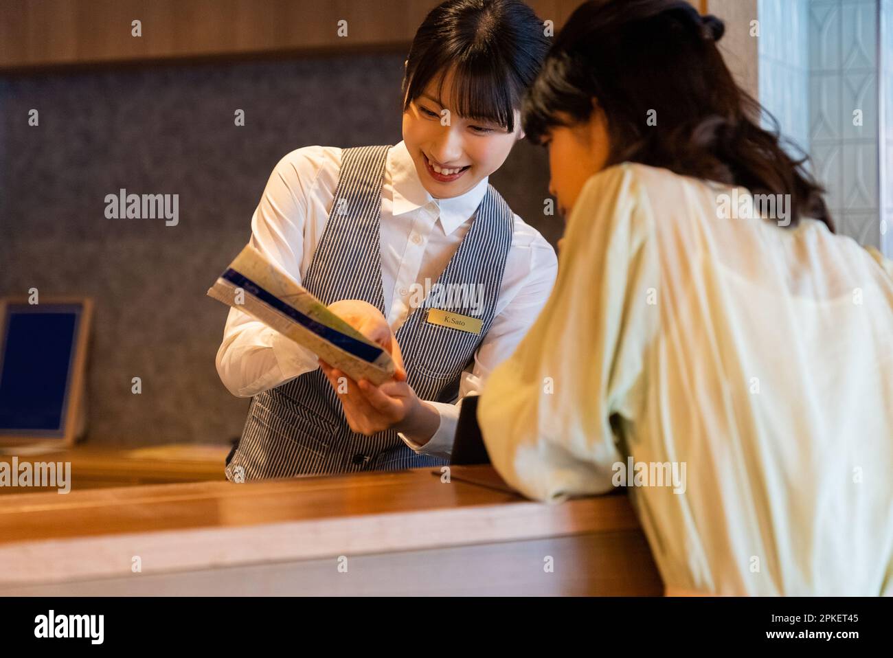 Check-in counter of a hotel Stock Photo - Alamy
