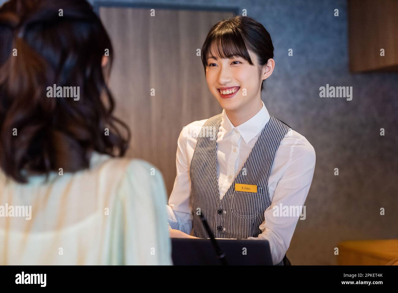 Hotel check-in counters Stock Photo - Alamy