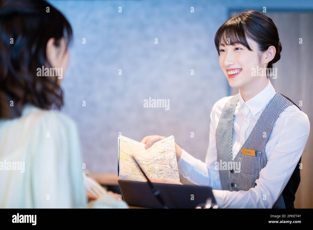 Hotel check-in counters Stock Photo - Alamy