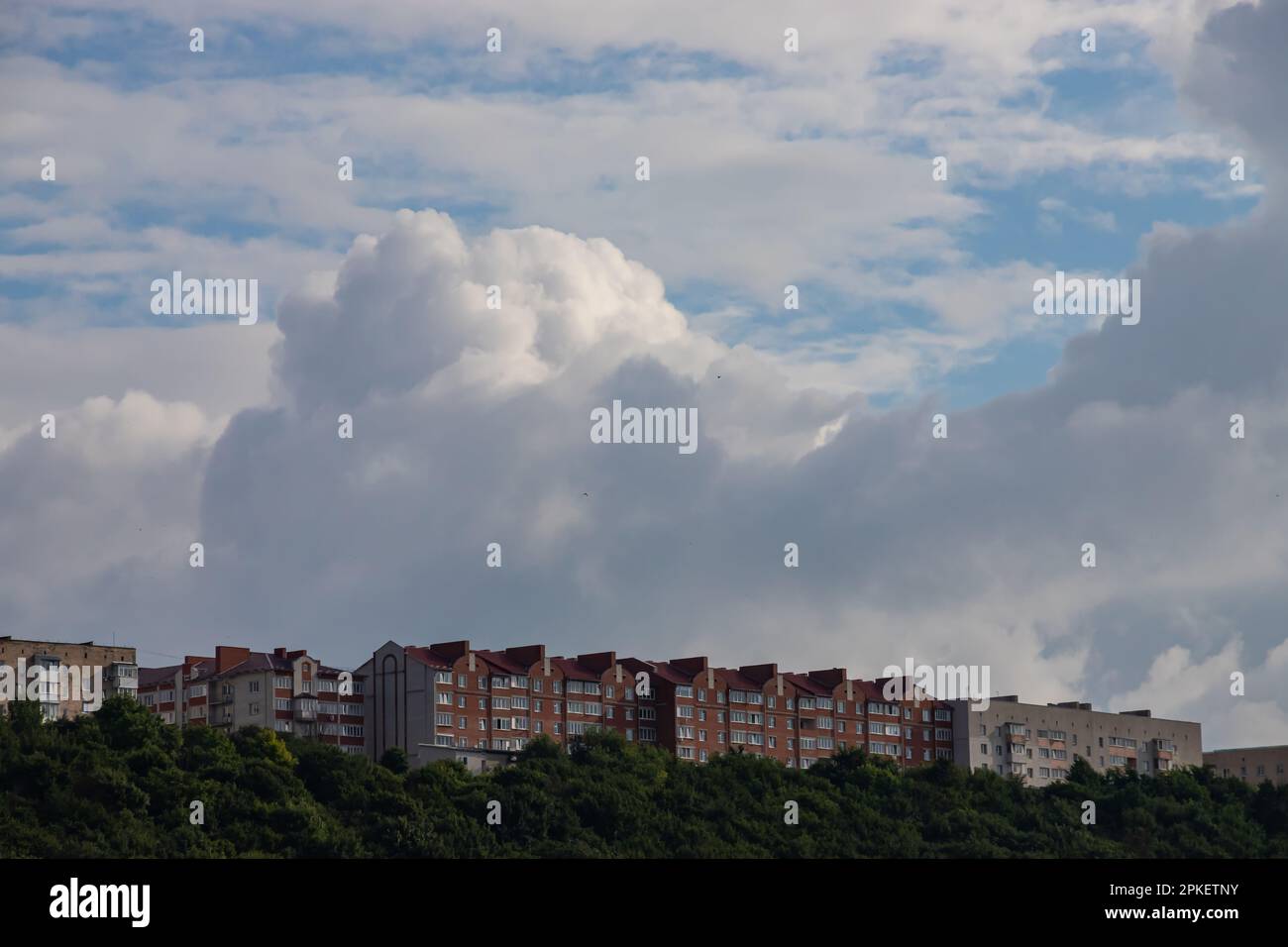 high-rise buildings on a hill on a background of sky Stock Photo - Alamy