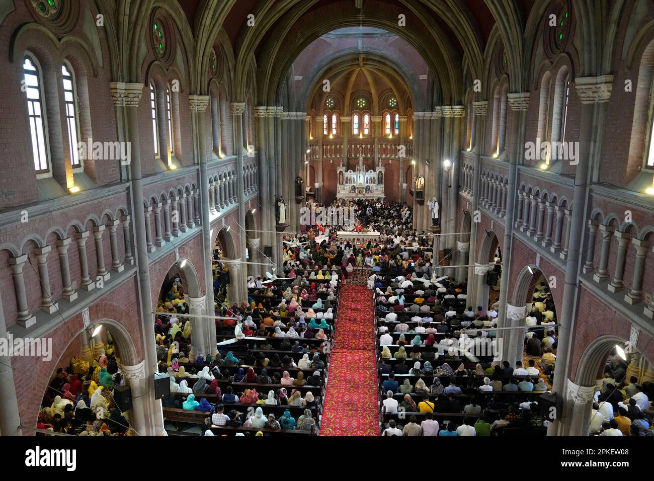 Christians attend Good Friday service at Sacred Heart Cathedral, in ...