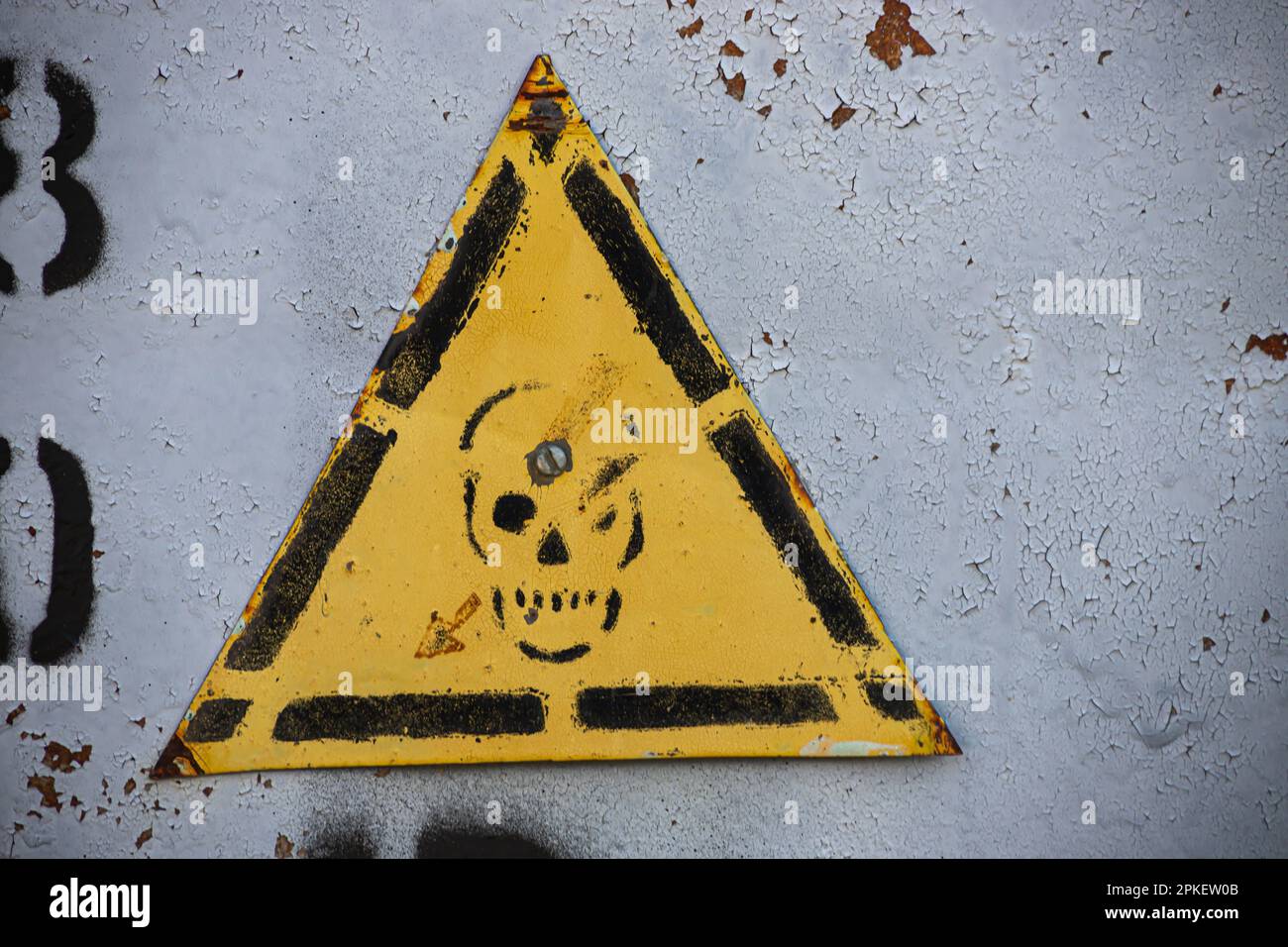 yellow danger warning sign with skull on the transformer booth Stock ...