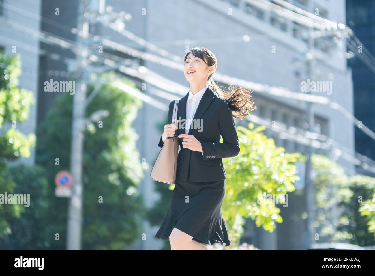 Running in suit hi-res stock photography and images - Alamy