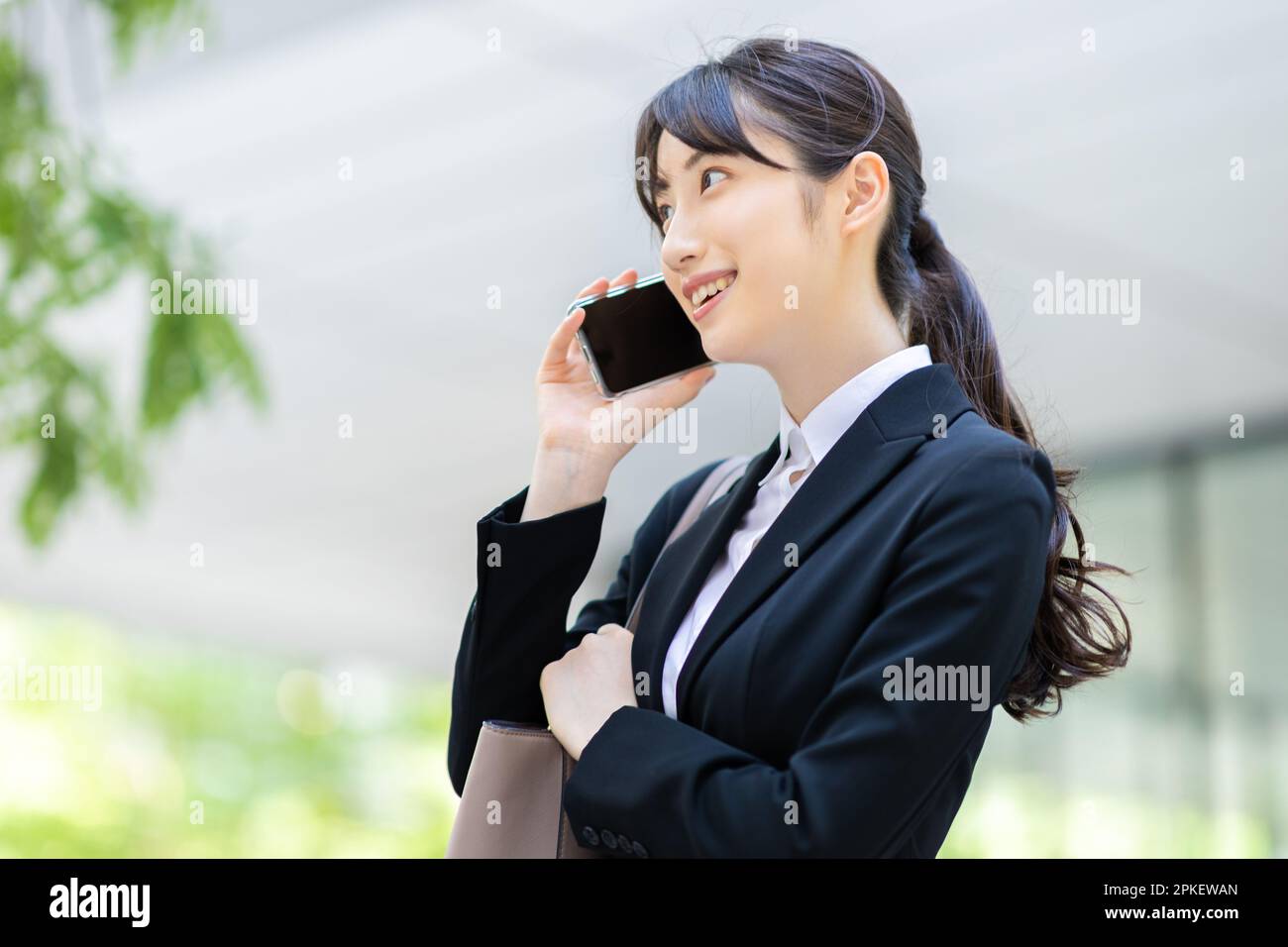 Woman making a phone call Stock Photo - Alamy