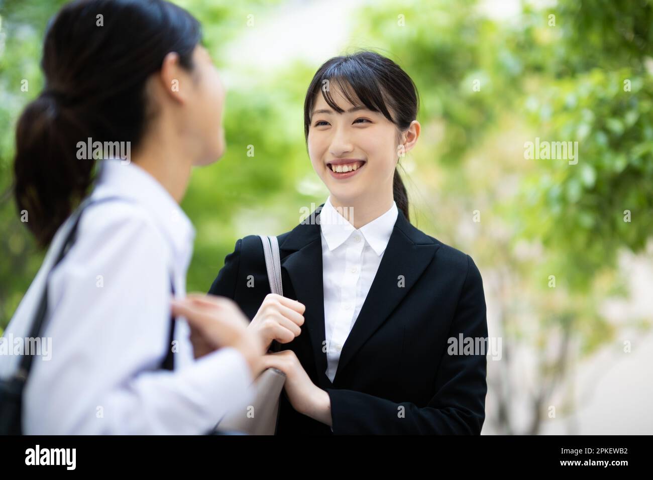 Two women having a conversation Stock Photo - Alamy