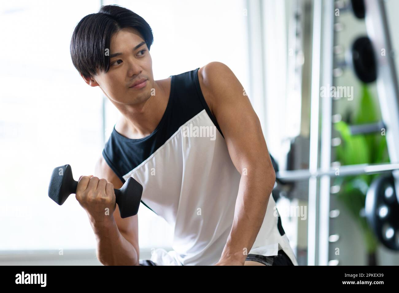 man doing strength training Stock Photo - Alamy