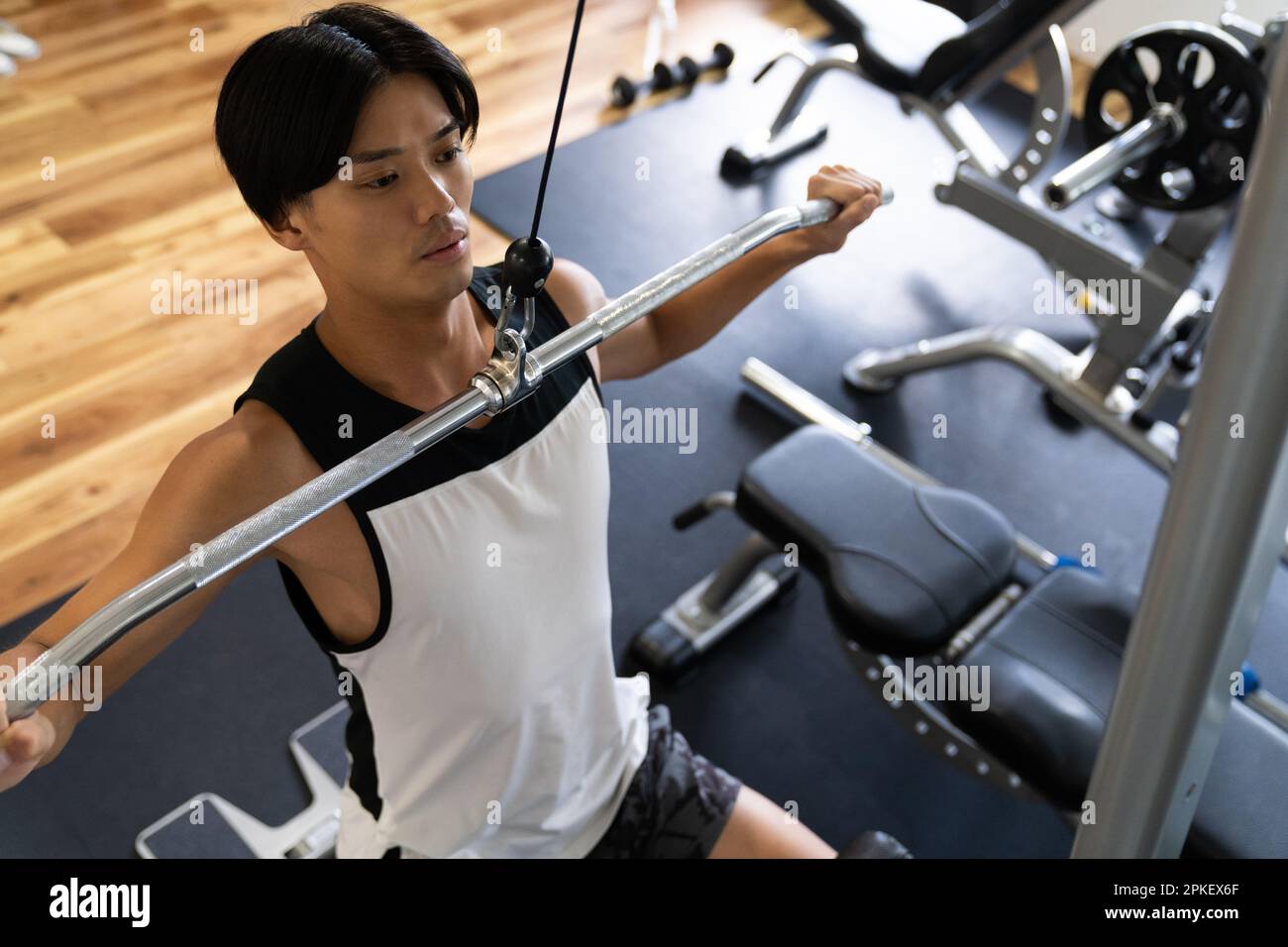 Men doing strength training Stock Photo - Alamy