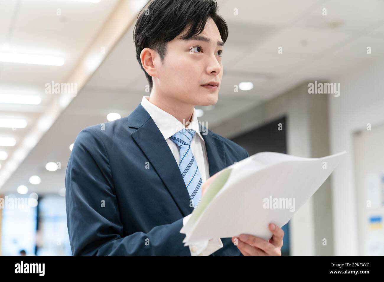 Asian businessman working documents hi-res stock photography and images ...
