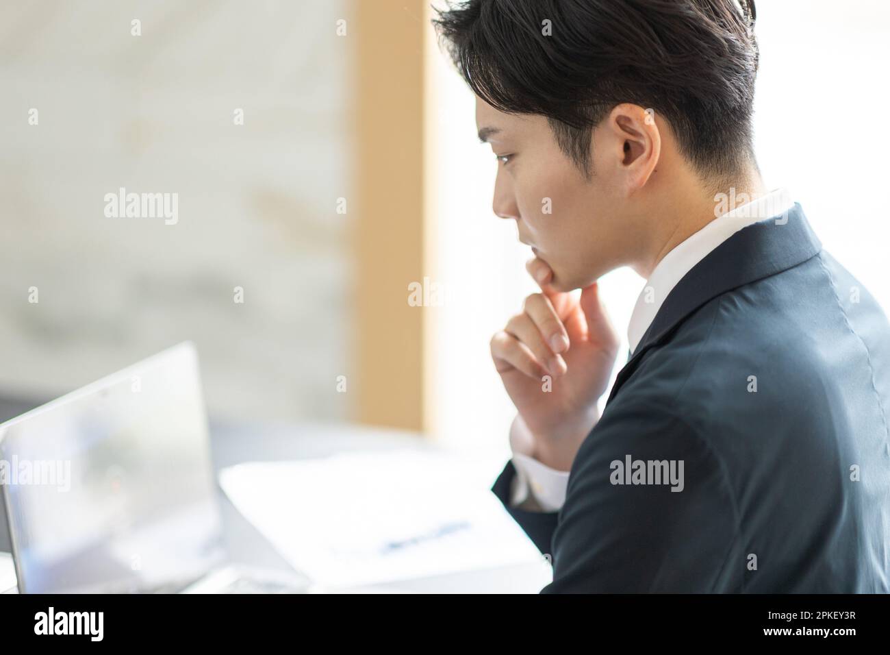Asian businessman looking laptop hi-res stock photography and images ...
