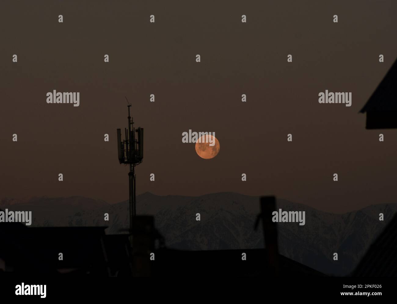 April 7, 2023, Srinagar, Jammu and Kashmir, India: Full moon sets above ...