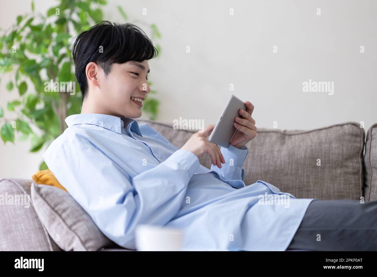 Men looking at tablets Stock Photo - Alamy