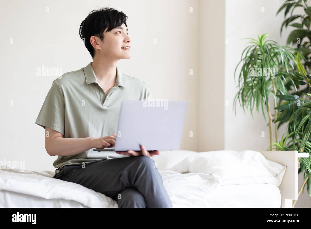 Man relaxing in bed hi-res stock photography and images - Alamy