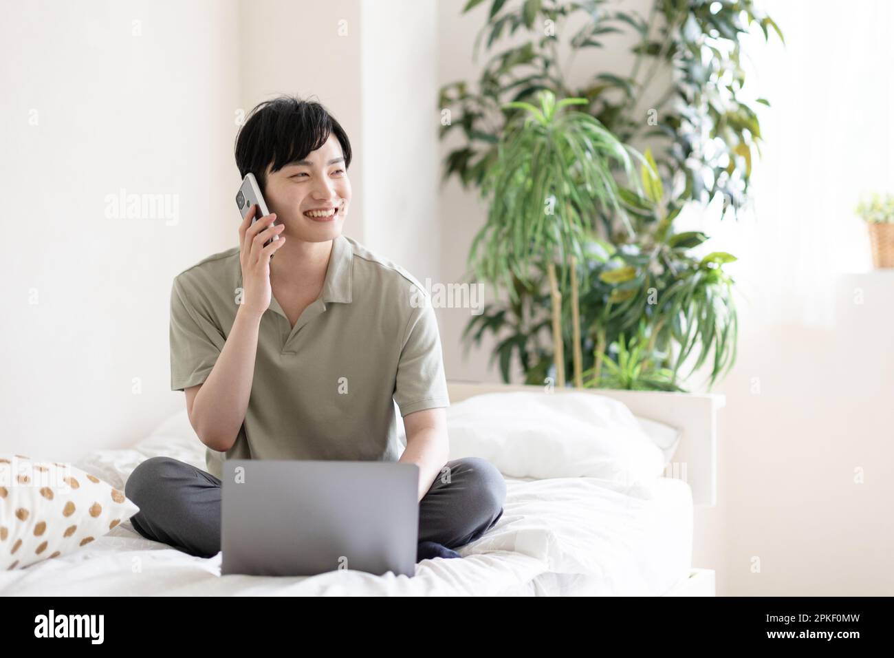 Man relaxing in bed hi-res stock photography and images - Alamy