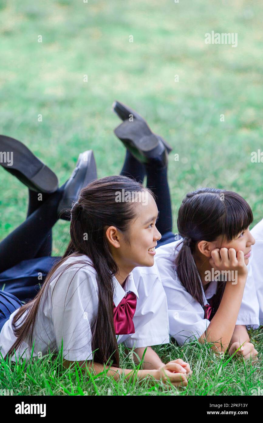 Junior high school student with cheekbones on a field Stock Photo - Alamy