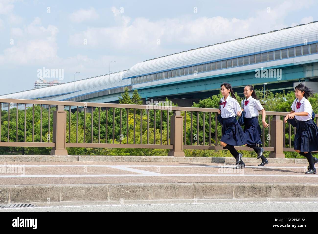 Junior High School Students Running on the Bridge Stock Photo - Alamy