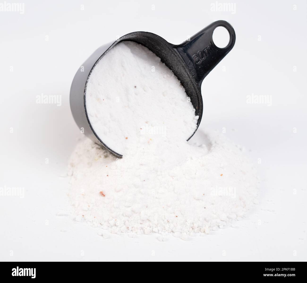 Dolomite mineral powder heep on white background Stock Photo - Alamy