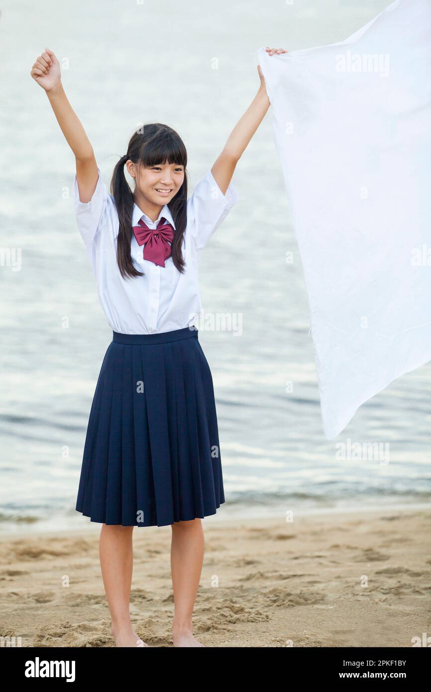 Junior high school students holding a flag Stock Photo - Alamy