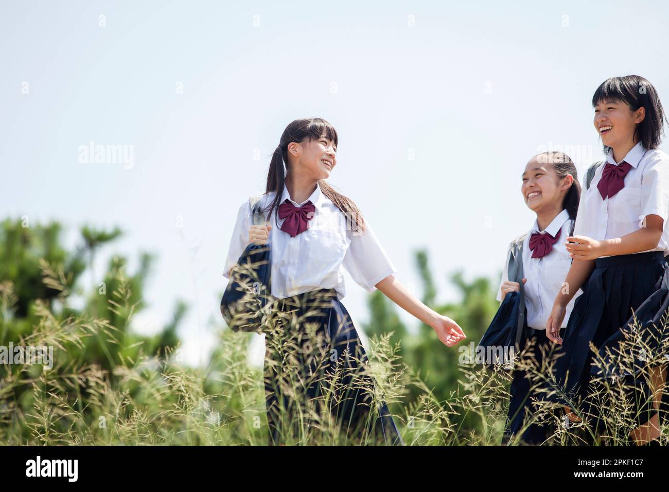 Talking while walking Stock Photo - Alamy