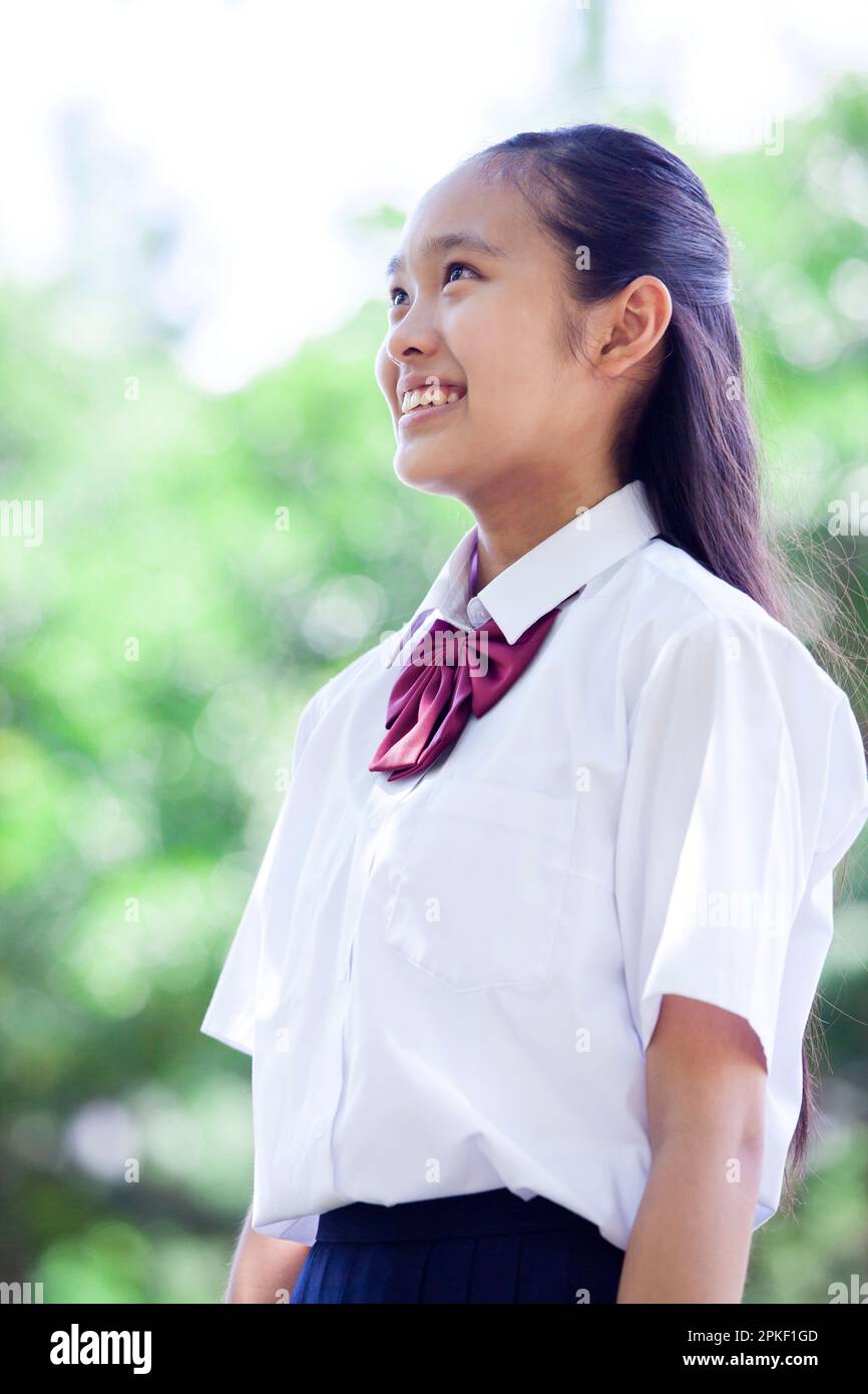 Junior high school students looking up Stock Photo - Alamy