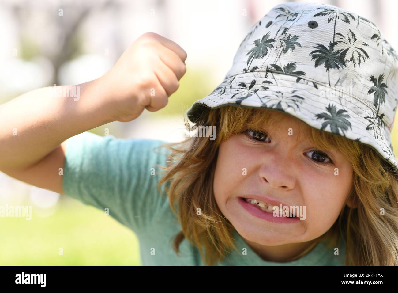 Child temper with angry expression. Angry hateful little anger boy ...
