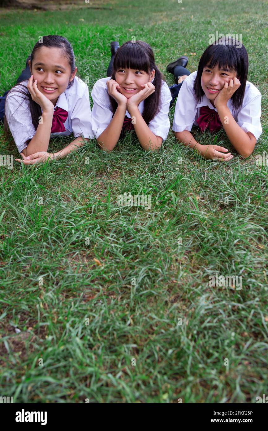 Junior High School Student with Cheek Cuppers on the Grass Stock Photo ...