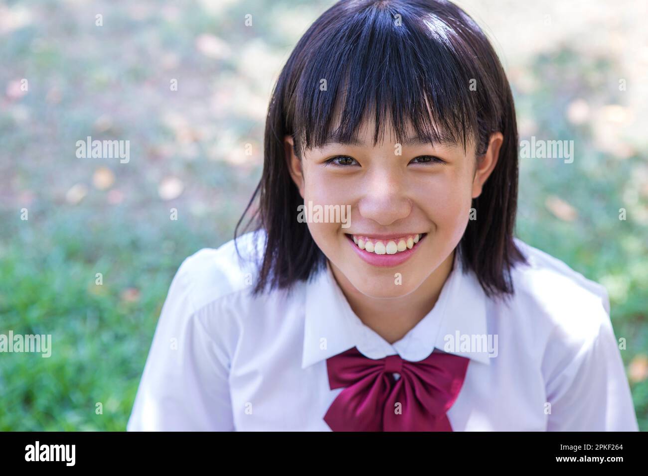 Smiling junior high school students Stock Photo - Alamy