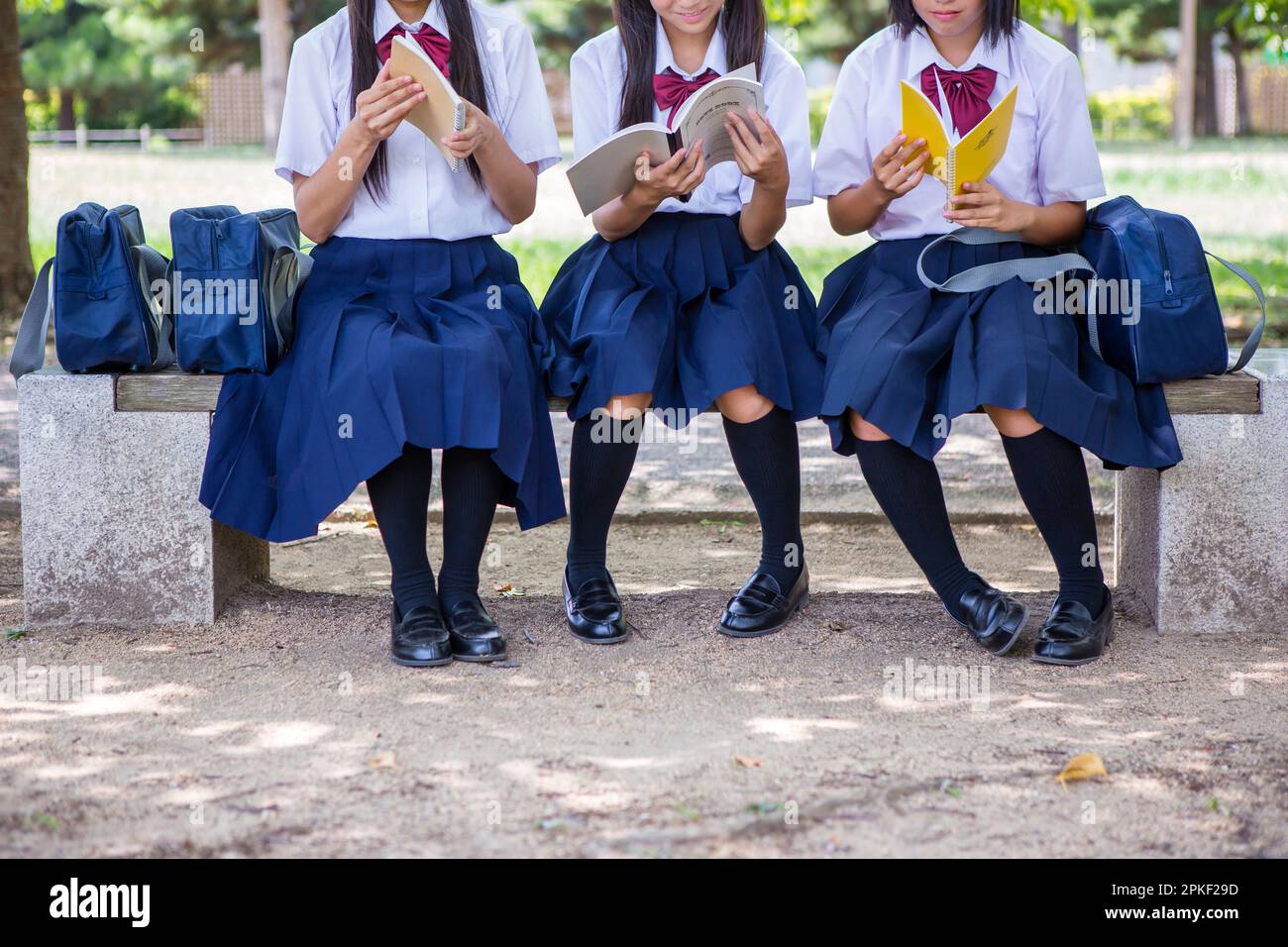 People on bench high hi-res stock photography and images - Alamy