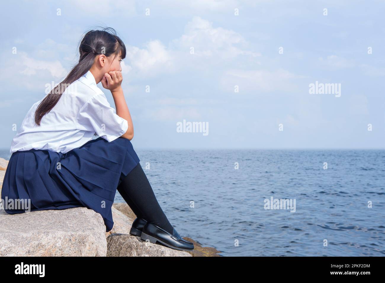 Junior High School Student on the Beach with Cheek Cuppers Stock Photo ...