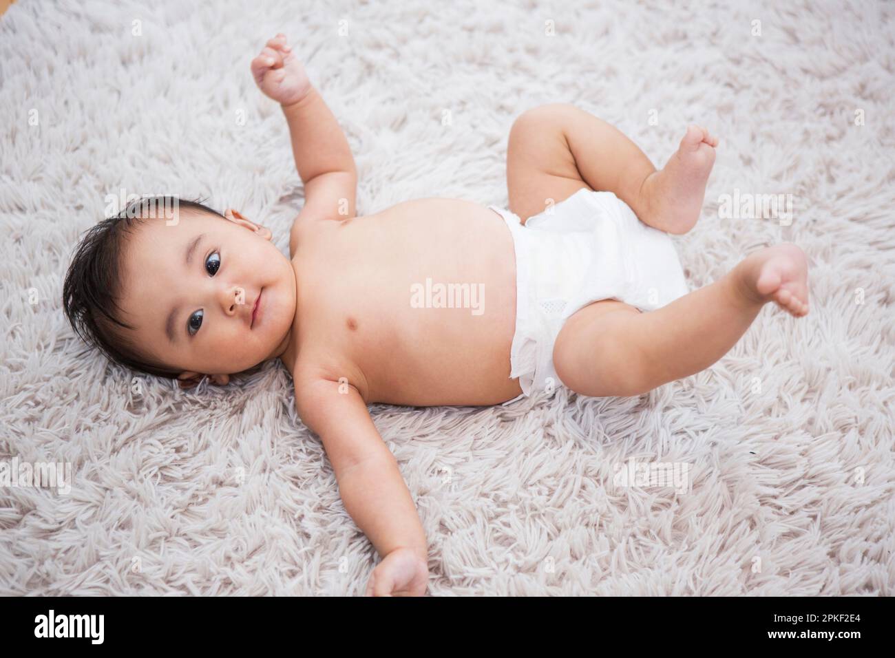 Baby in Diaper Stock Photo - Alamy