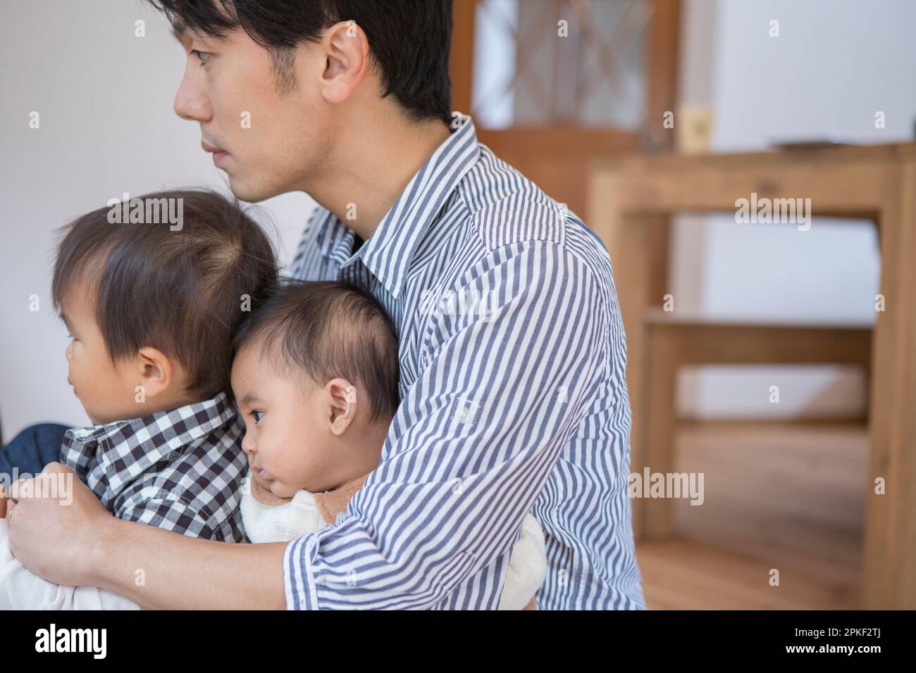 Father holding child Stock Photo - Alamy